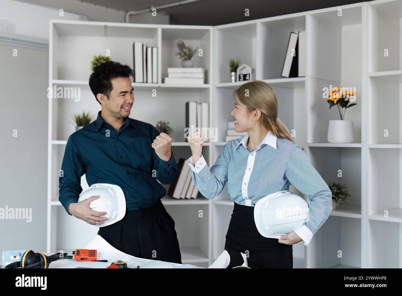 Engineer and architect collaboration in office creative blueprint ...