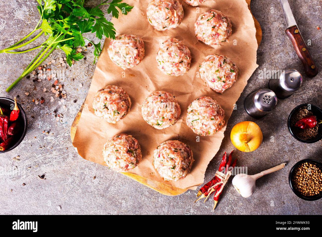 Raw meatball over beton background ready for cooking Stock Photo - Alamy