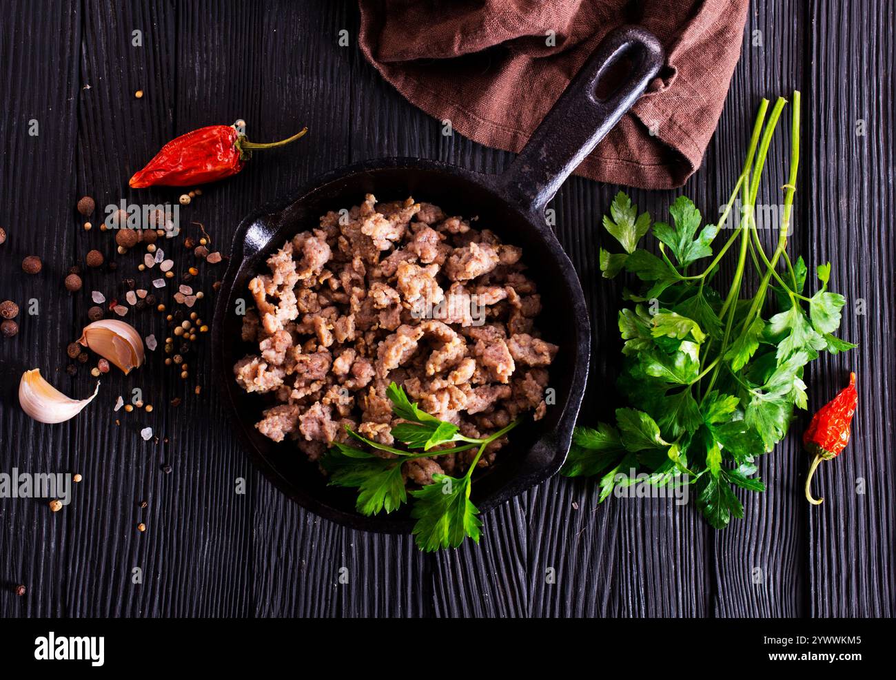 Pan fried minced meat in pan, Gray background. Top view Stock Photo - Alamy