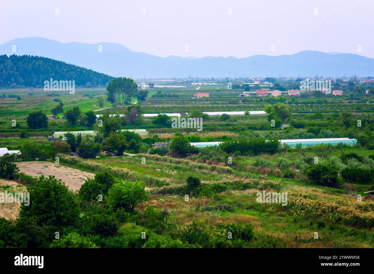 View at clean and preserved green valley Stock Photo - Alamy