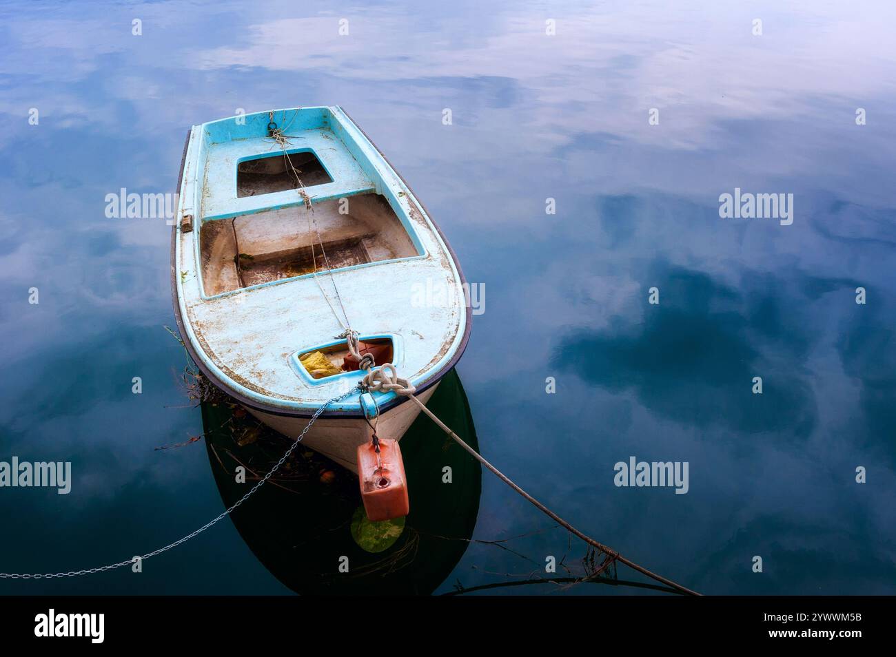 Abandoned and Ruined Old Ship Moored in a River Port, Reflecting Decay ...