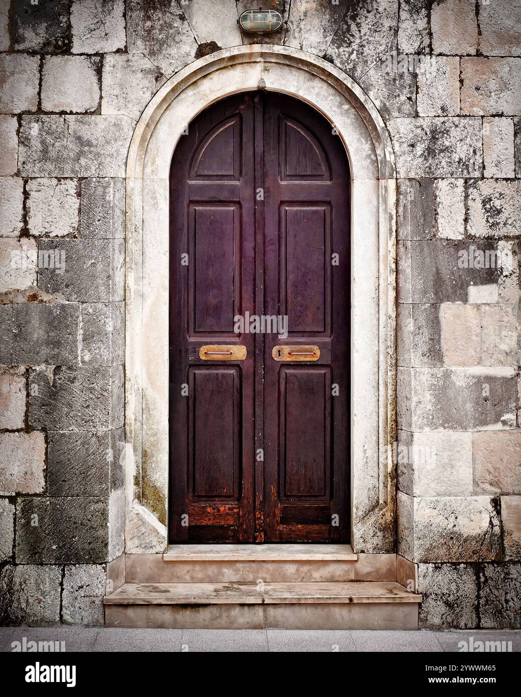 Small Old Wooden Church Door with Arch and Iron Details, Reflecting ...