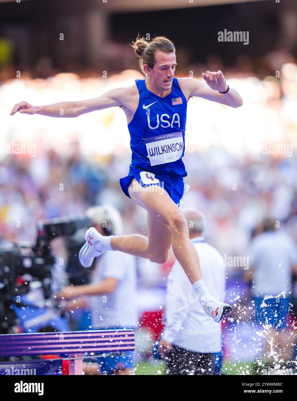 Matthew Wilkinson participating in the 3000 metres steeplechase at the ...