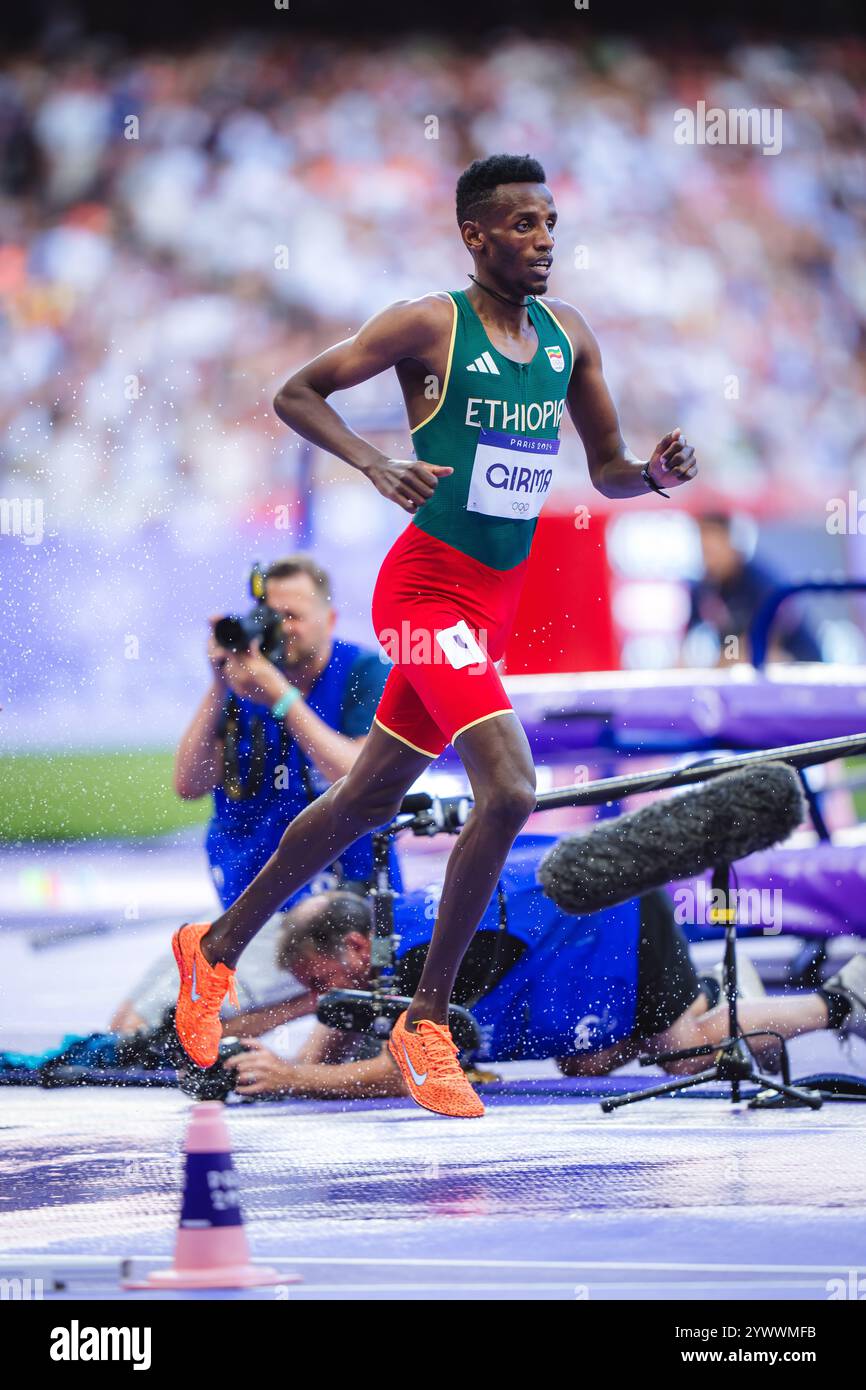 Lamecha Girma participating in the 3000 metres steeplechase at the ...
