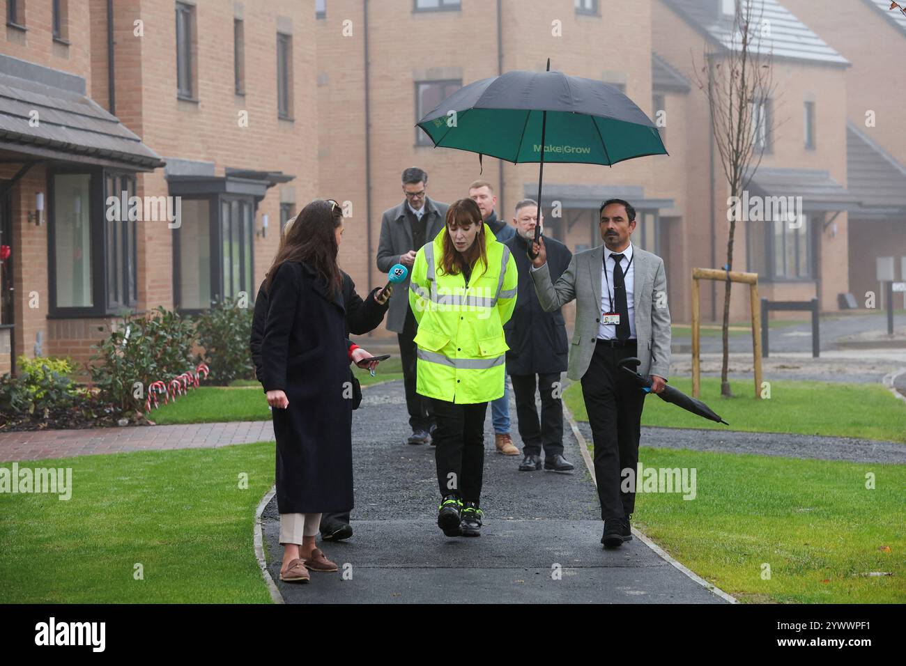 Deputy Prime Minister Angela Rayner (centre) speaks to the media during ...