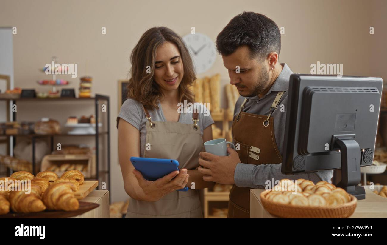 Friendly male female bakery hi-res stock photography and images - Alamy
