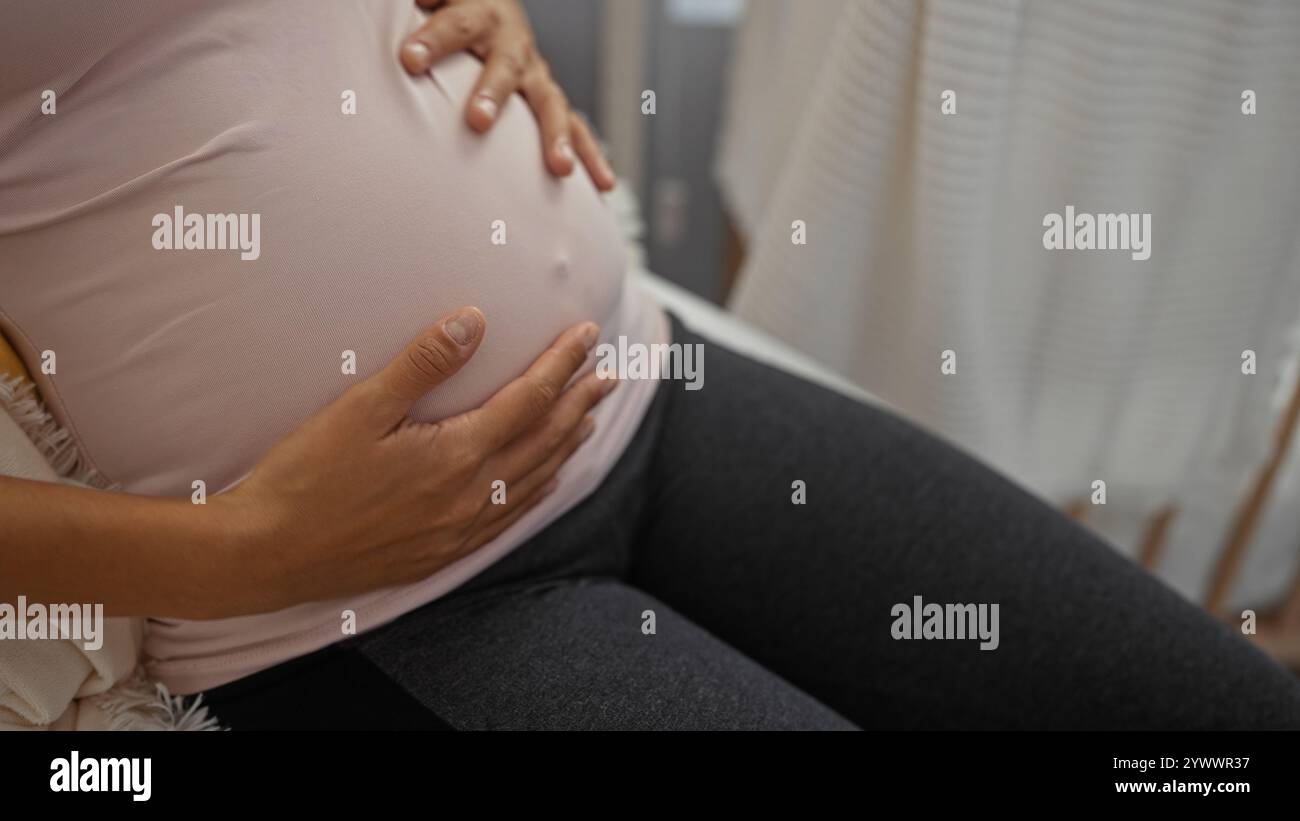 Pregnant belly lap hi-res stock photography and images - Alamy