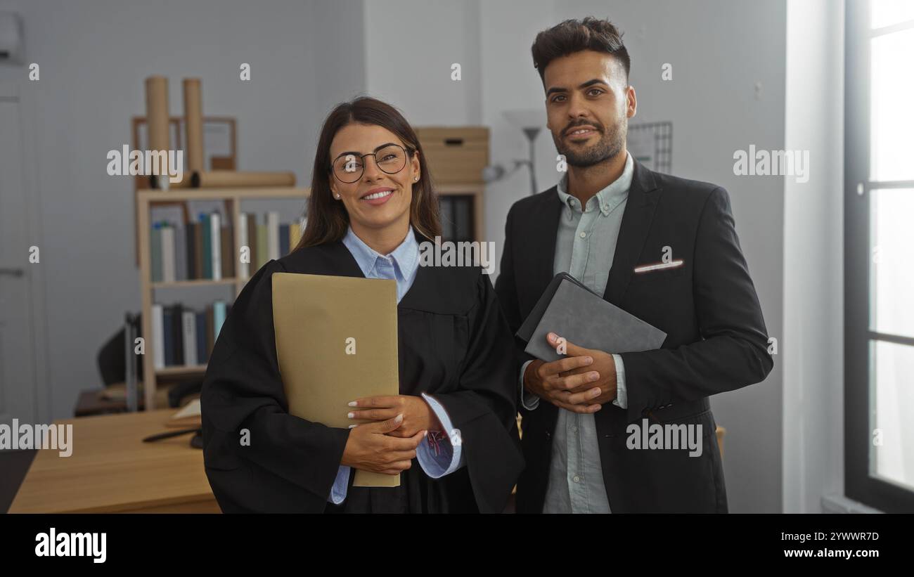 Woman judge and man lawyer standing together in an office, showcasing ...