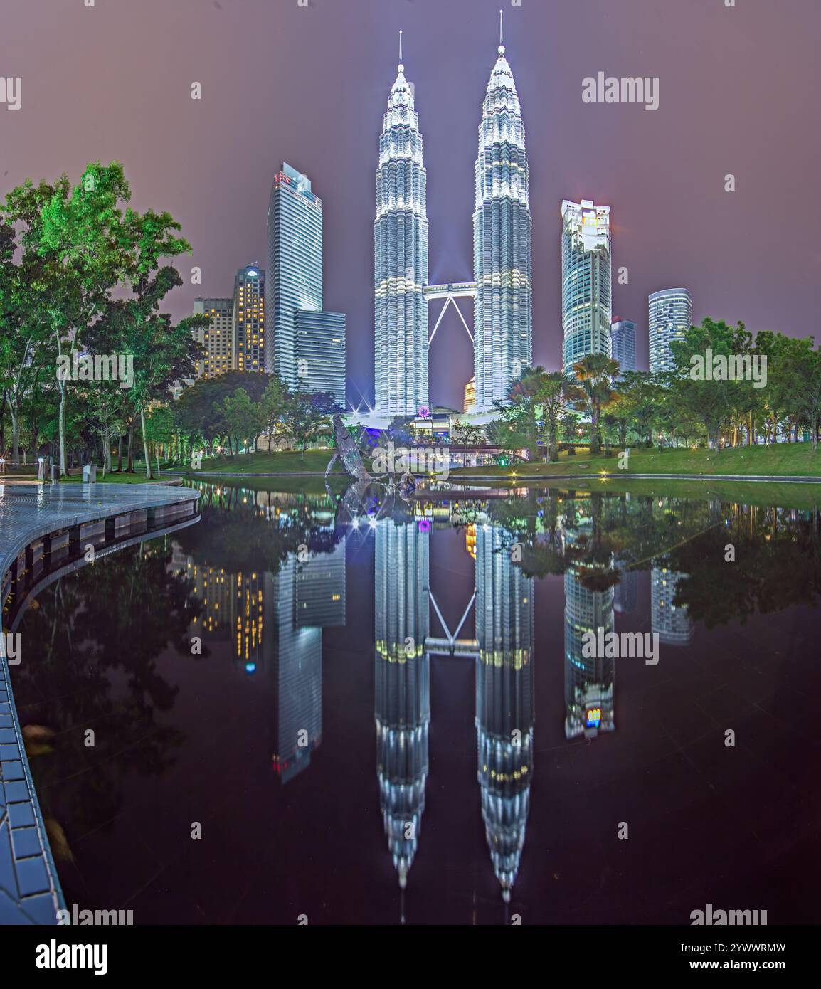 Night view of Kuala Lumpur's iconic skyline surrounded by modern ...