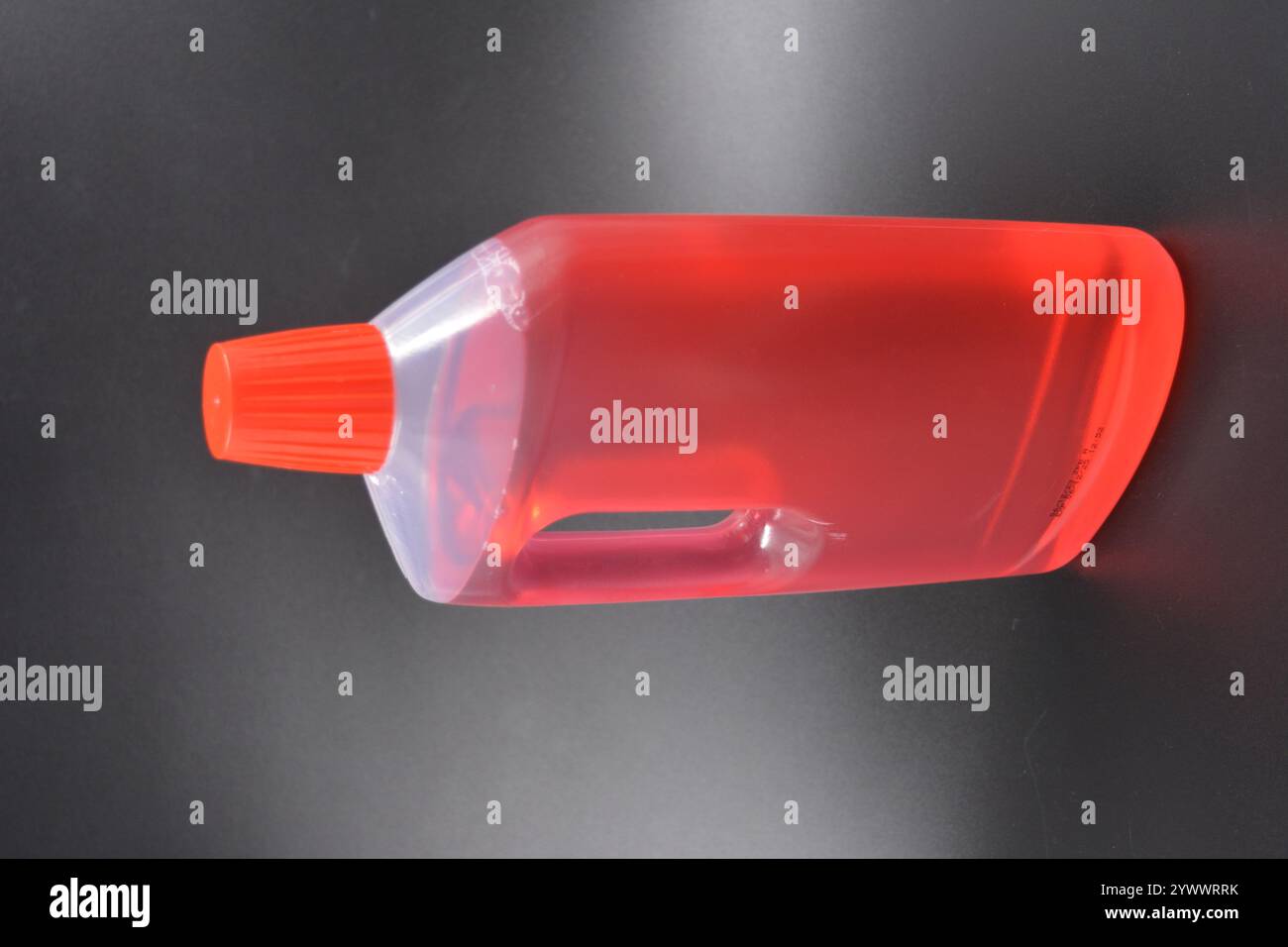 A large transparent bottle for washing clothes, bed linen, fabrics and ...