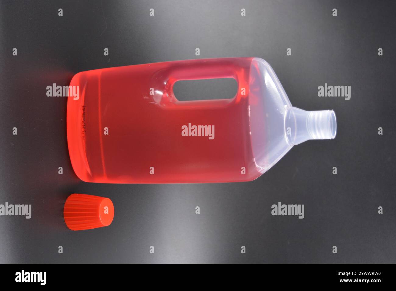 A large transparent bottle for washing clothes, bed linen, fabrics and ...