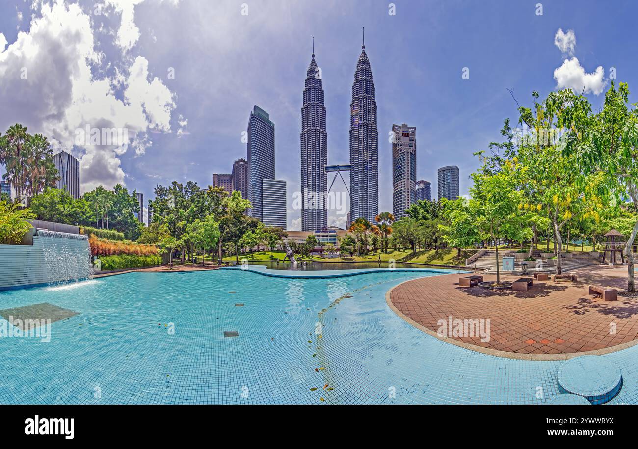 Kuala Lumpur's skyline viewed from the park in daylight showcasing ...