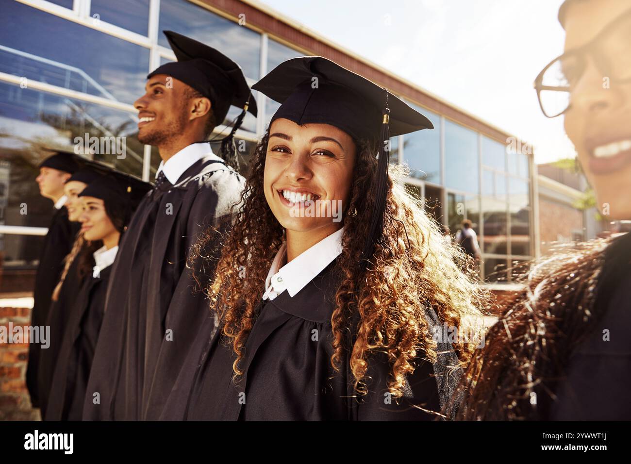 Proud, students and graduation of ceremony outdoor of education diploma ...
