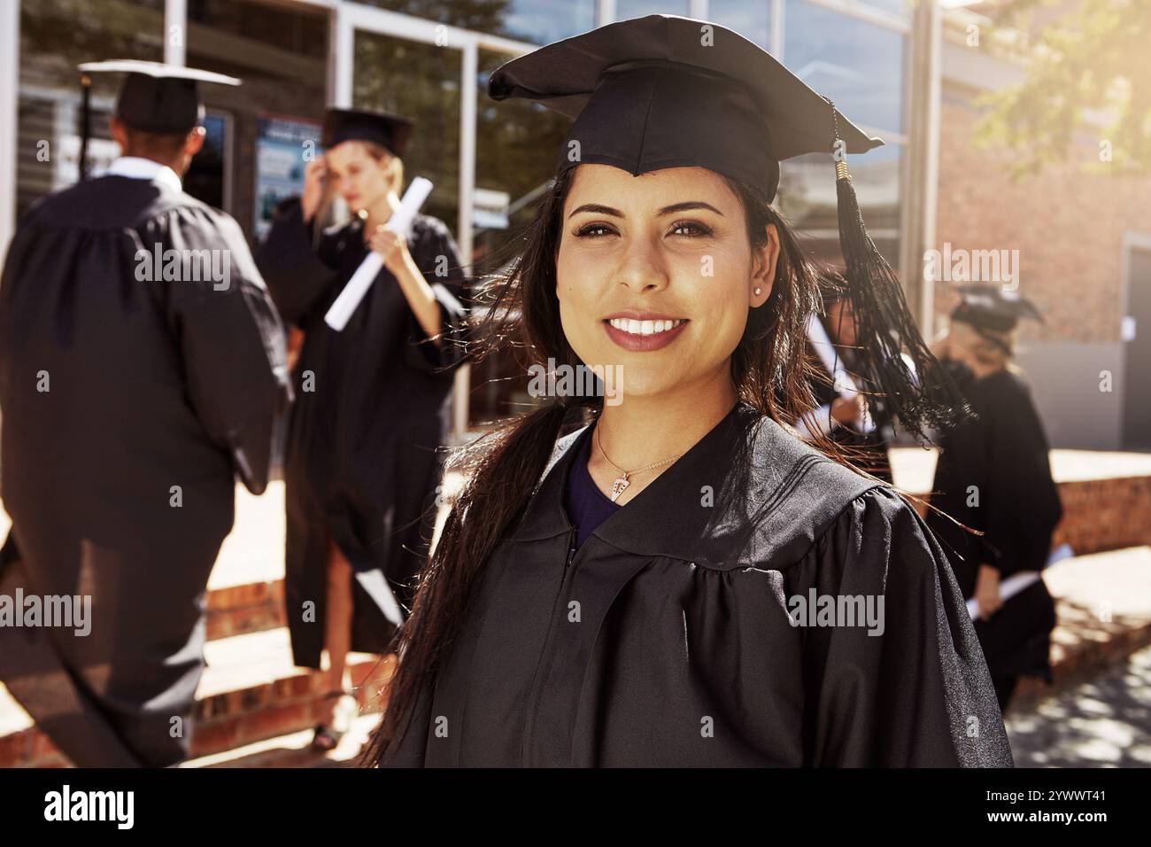Portrait, happy woman and graduation of student at university for ...