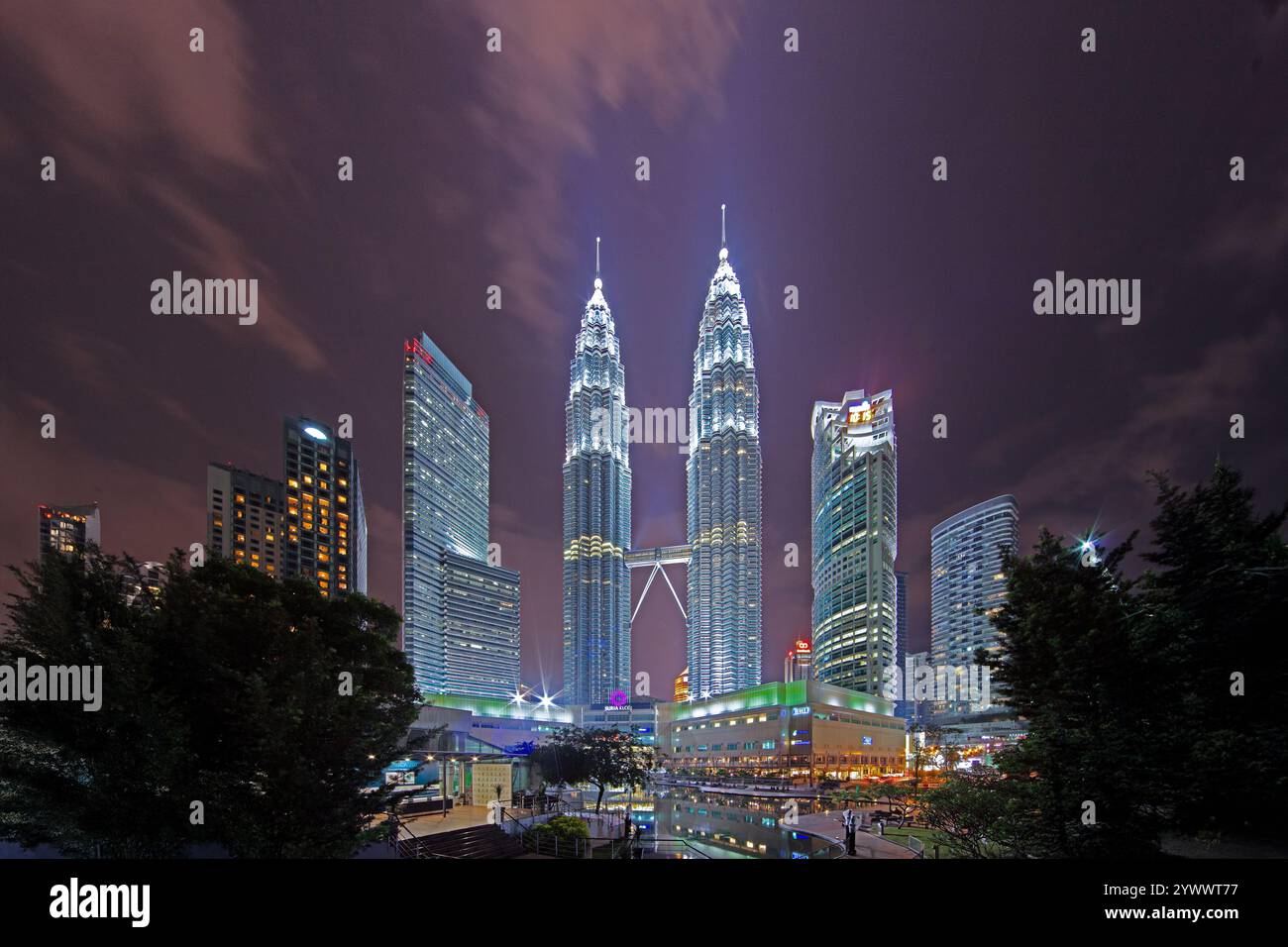 Night view of Kuala Lumpur's iconic skyline surrounded by modern ...