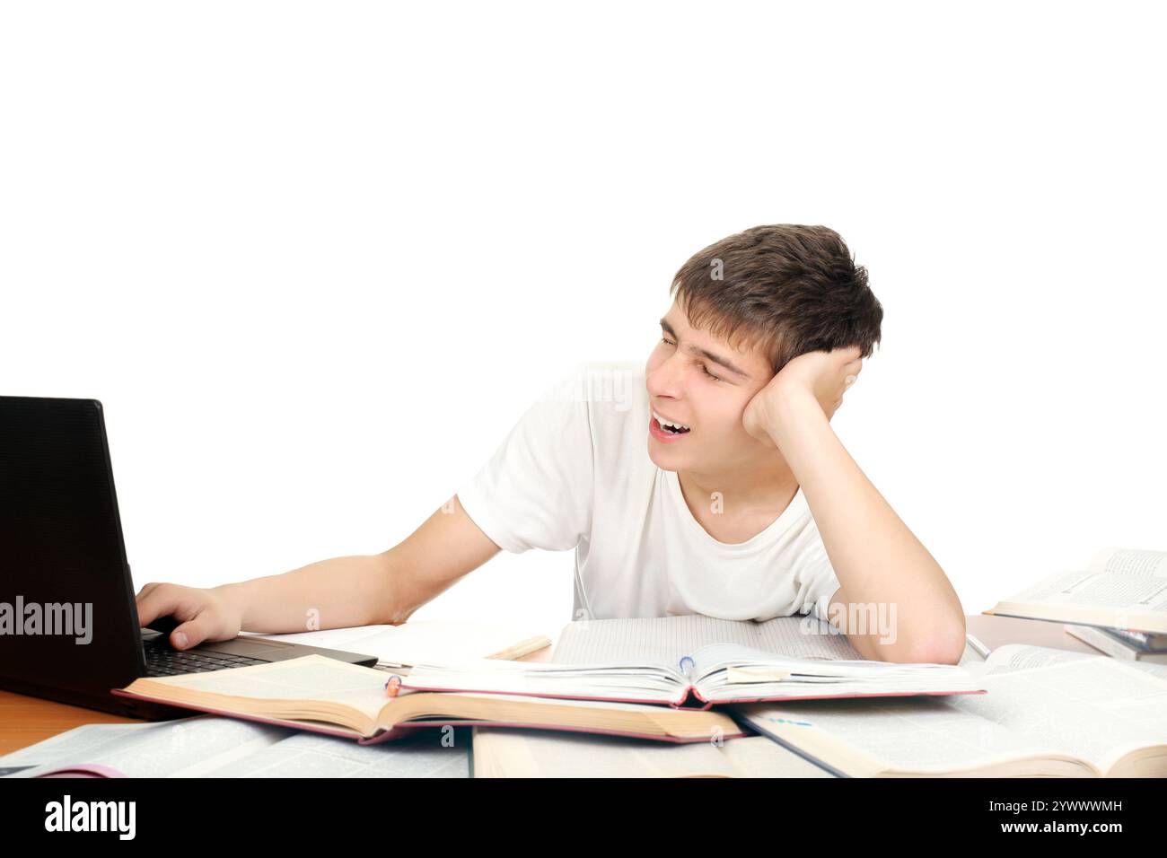 Tired Student Yawning on the School Desk. Isolated on the White Stock ...