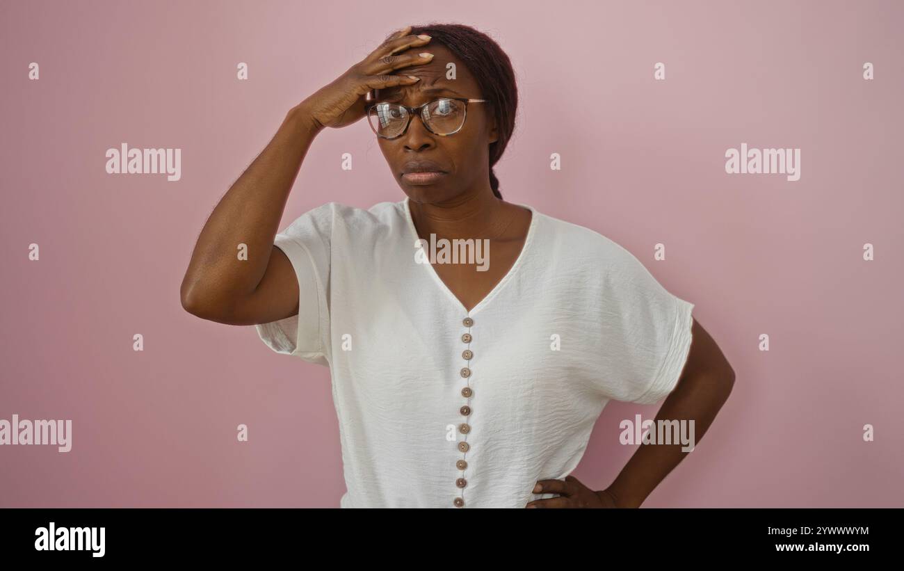 Woman thinking over isolated pink background showing emotion Stock ...