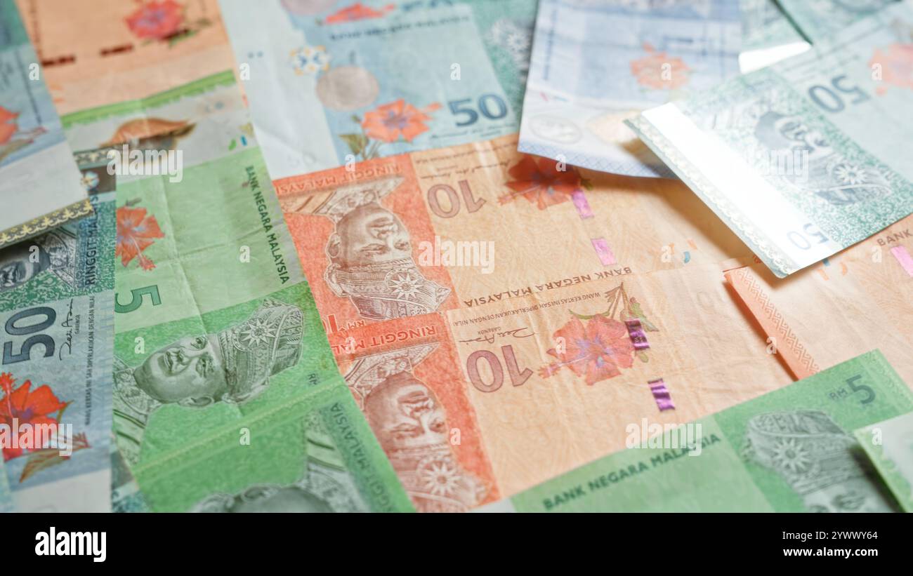 Colorful assortment of malaysian ringgit banknotes in various ...