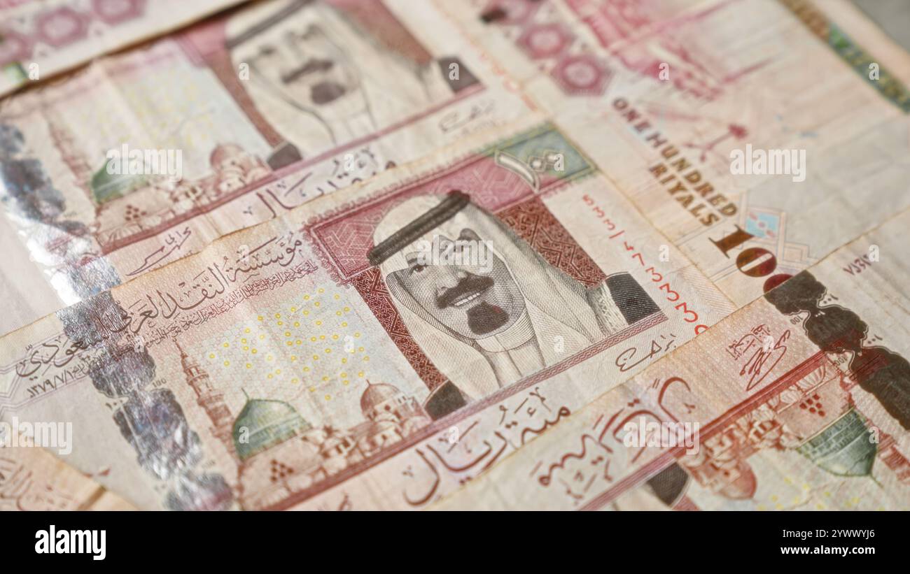 Saudi arabian banknotes featuring various denominations of riyals ...