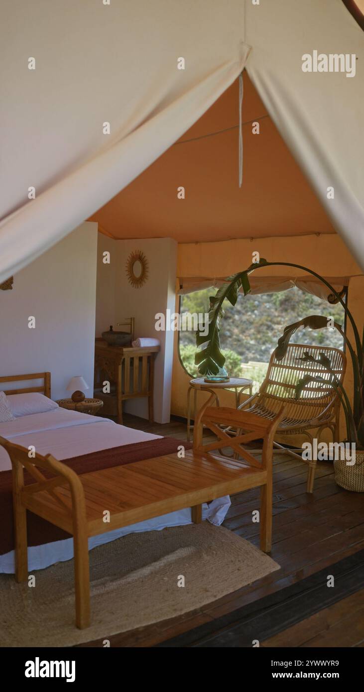 Cozy nature-themed tent interior in africa, showcasing a comfortable ...