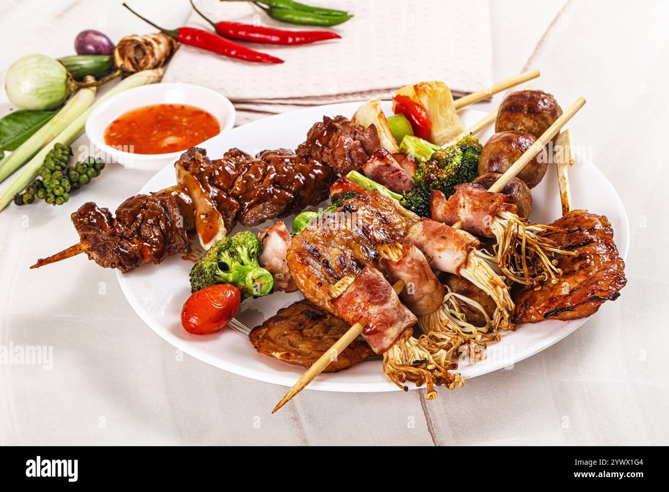 Asian grilled skewer assortment satay with beef, porl, chicken and ...