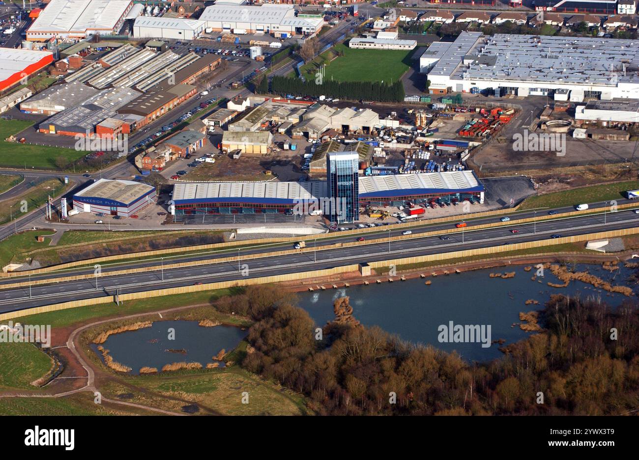 An aerial view of M6 Toll motorway and Lakeside Plaza offices in ...
