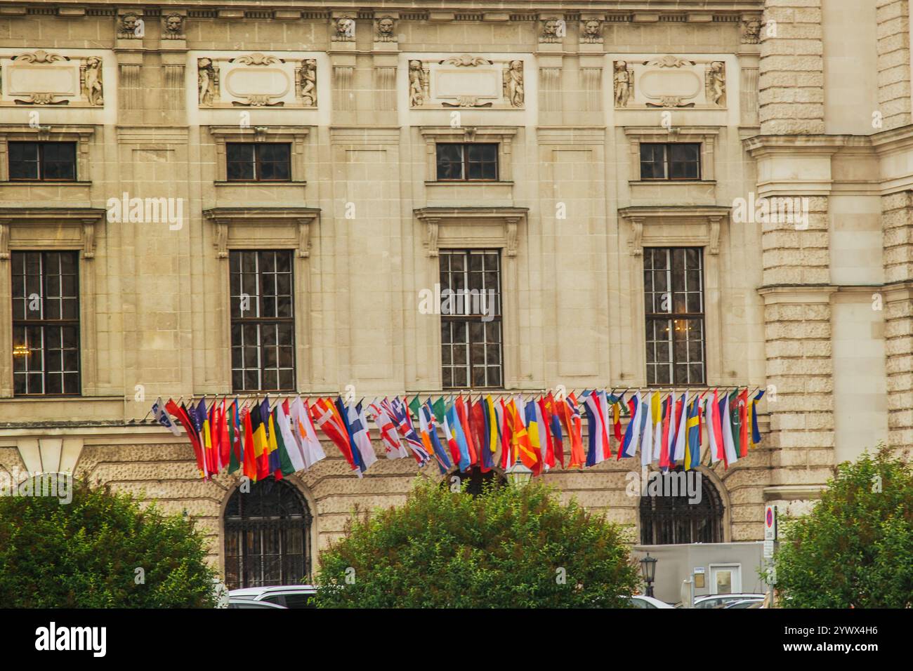 Vienna, Austria - May 12, 2019: View of countries flags in on raw ...