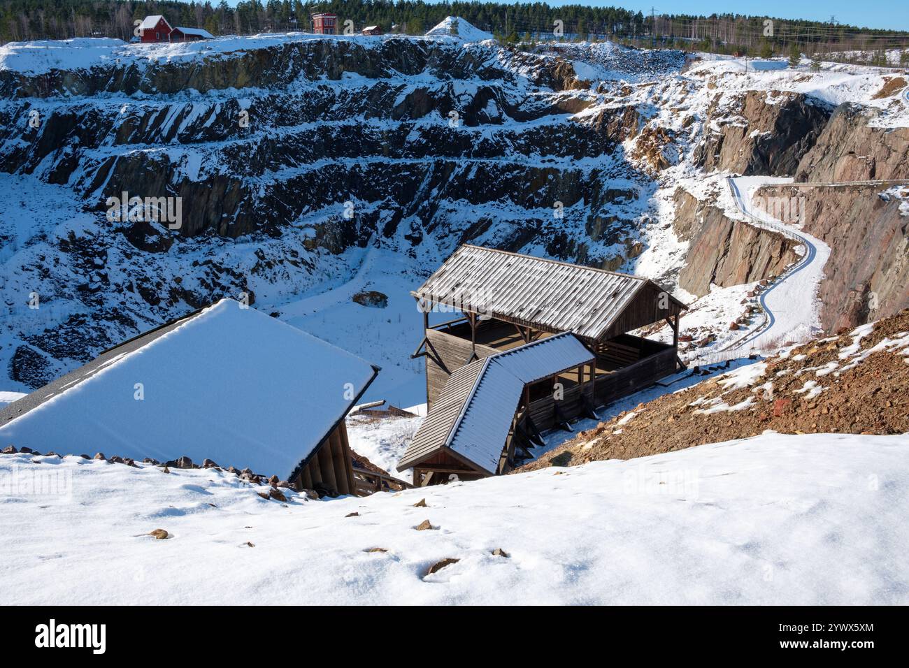 Snow blankets the historic Falun Mine in Dalarna, Sweden, highlighting ...