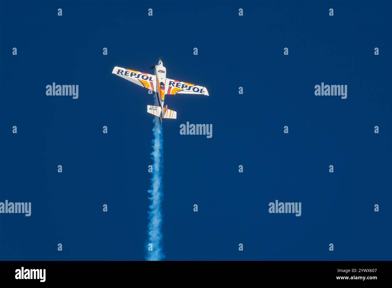 Stunt aerobatic plane performing stunts in air Stock Photo - Alamy