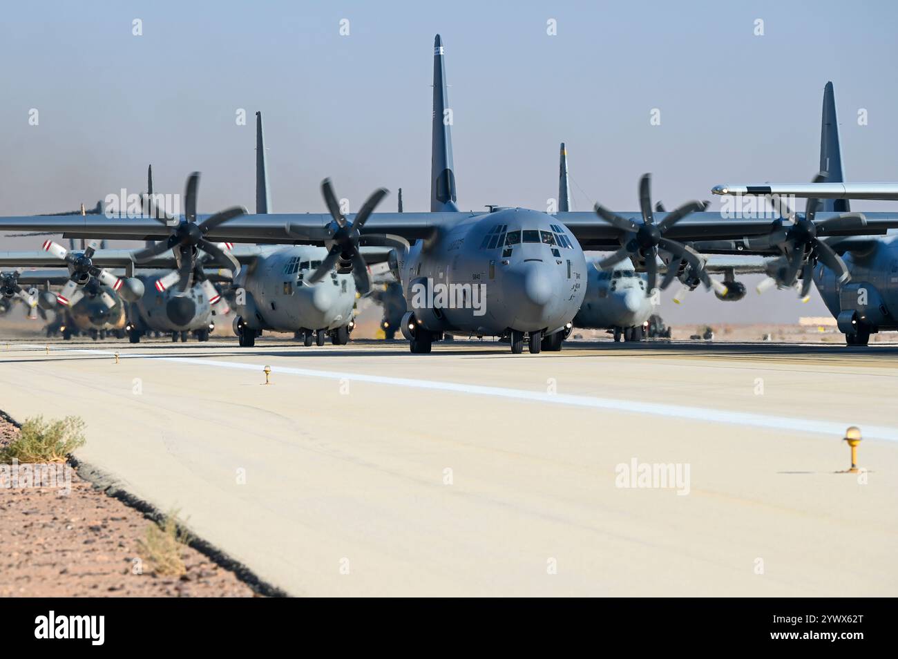 U.S. Air Force and coalition partnered aircraft taxi onto the runway to ...