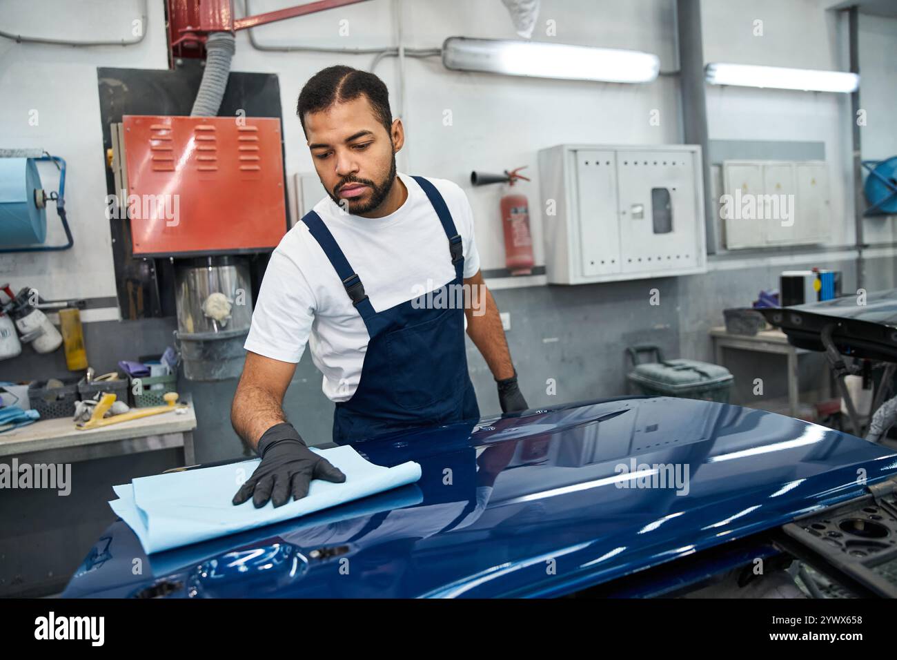 Young man focused on cleaning hi-res stock photography and images - Alamy