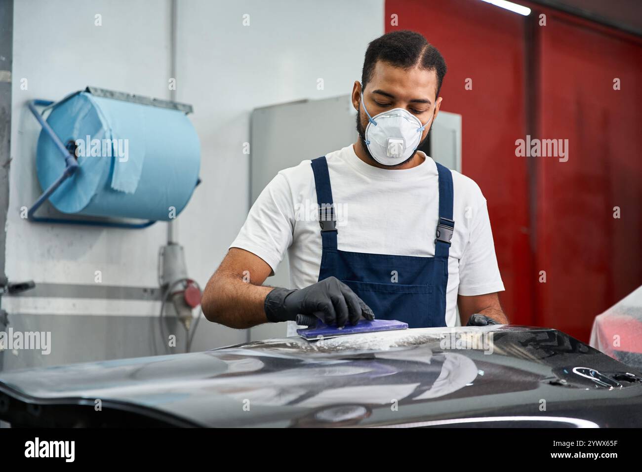 Car mechanic wearing protective hi-res stock photography and images - Alamy