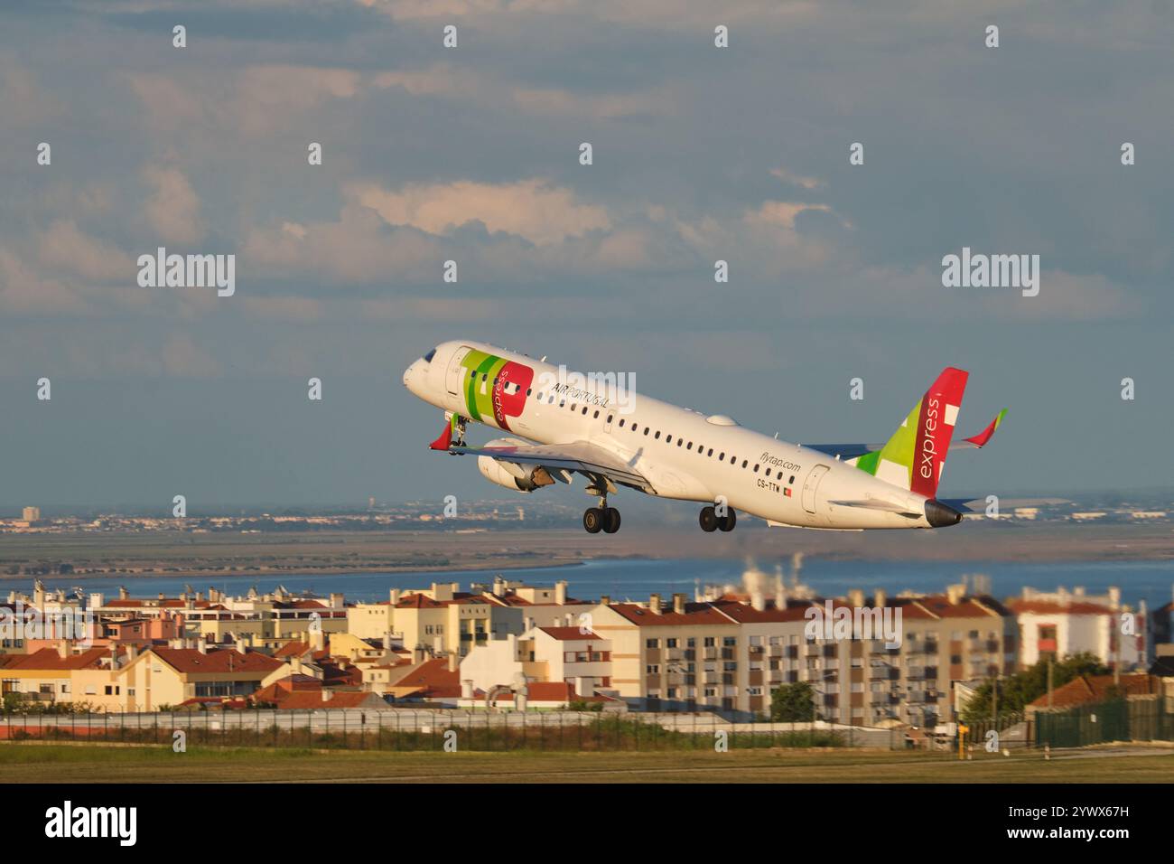 TAP Air Portugal Airbus Embraer E195AR passenger plane take off in ...