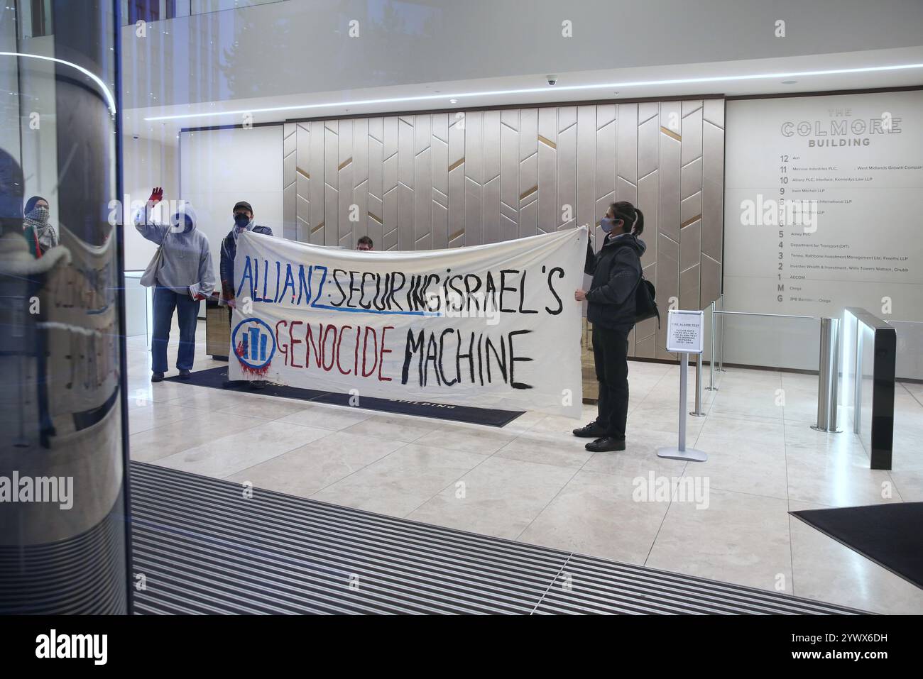 Bimingham, England, UK. 12th Dec, 2024. Activists protest inside the ...