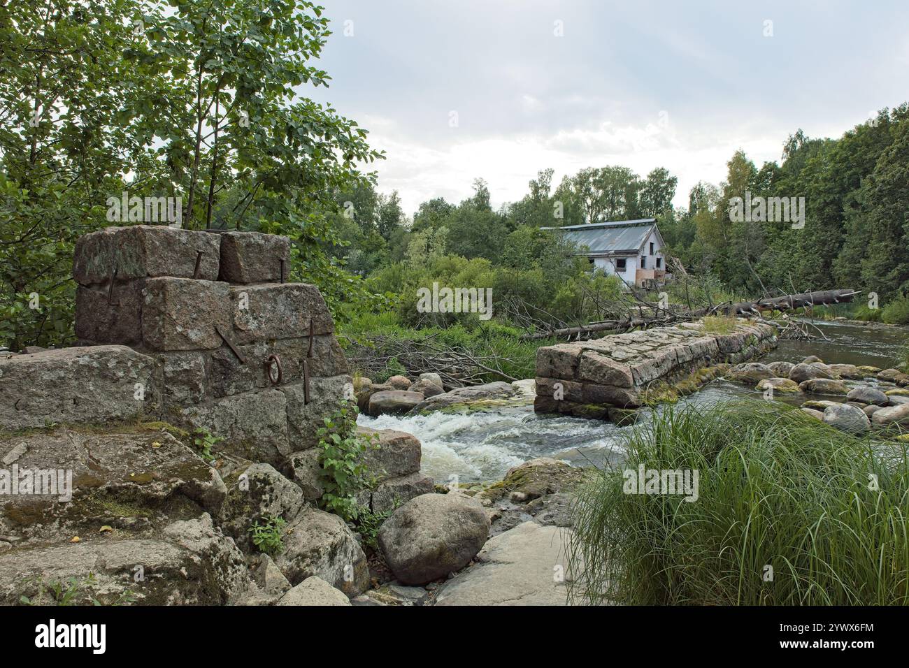 Old stone Vantaankoski dam in cloudy summer weather, Vantaa, Finland Stock Photo - Alamy