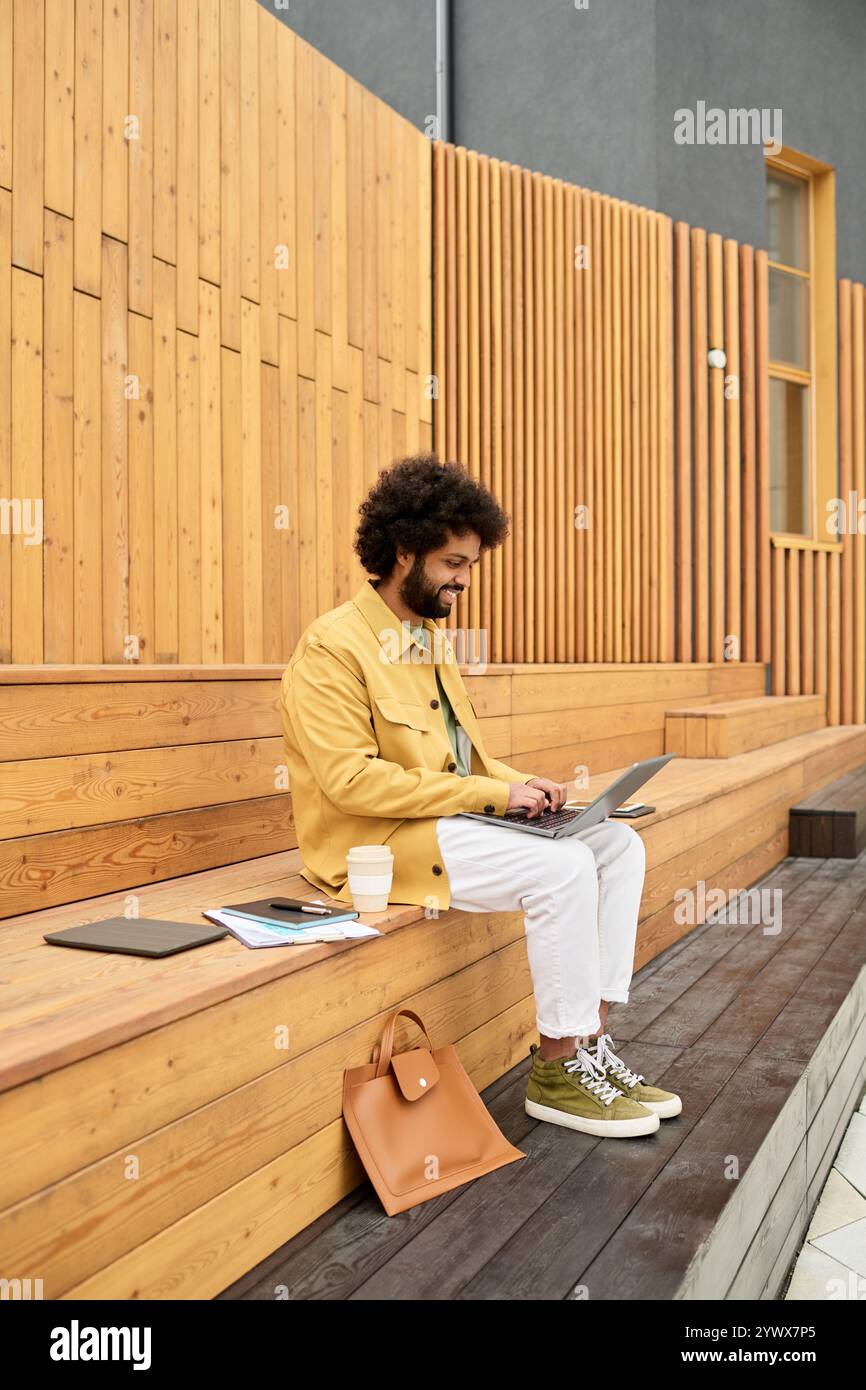 Man sitting outside working on hi-res stock photography and images - Alamy