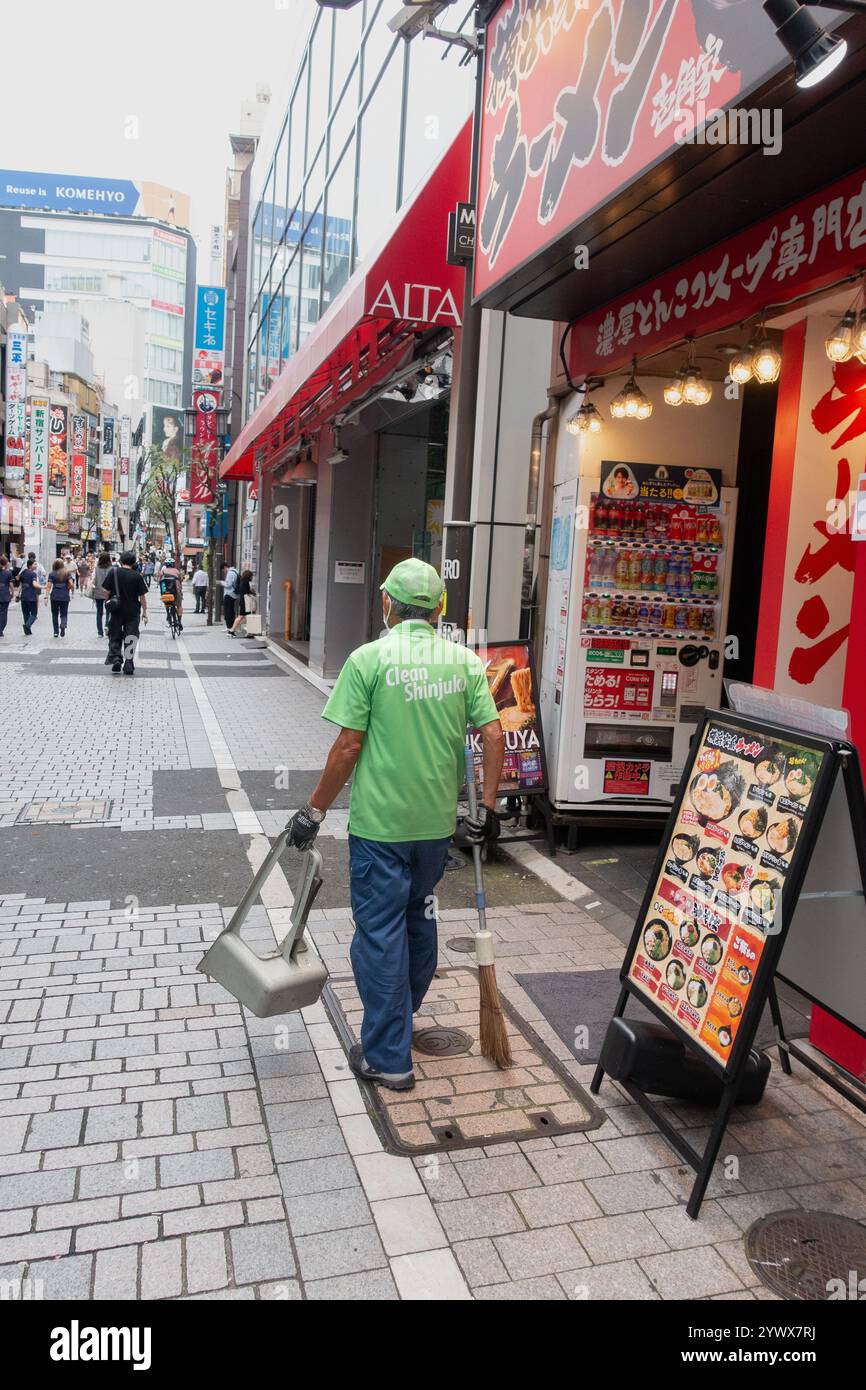 Street cleaner in the pedestrian zone of Shinjuku, Tokyo, Japan, Asia ...
