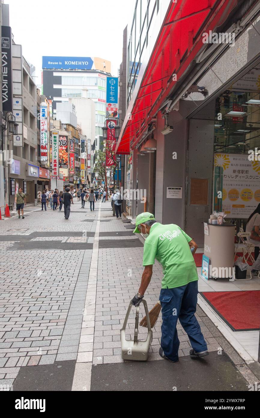 Street cleaner in the pedestrian zone of Shinjuku, Tokyo, Japan, Asia ...