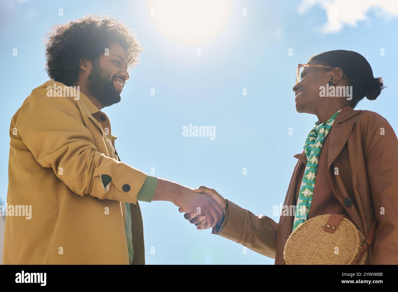 Multi-Ethnic Professionals Shaking Hands Outdoors Stock Photo - Alamy