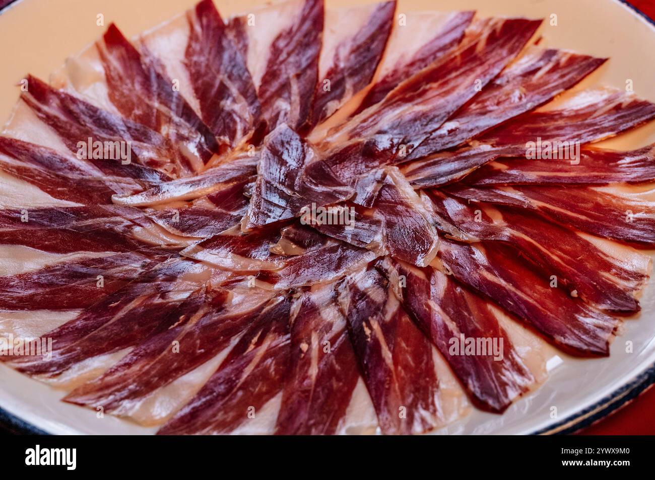 Thinly sliced spanish ham hi-res stock photography and images - Alamy
