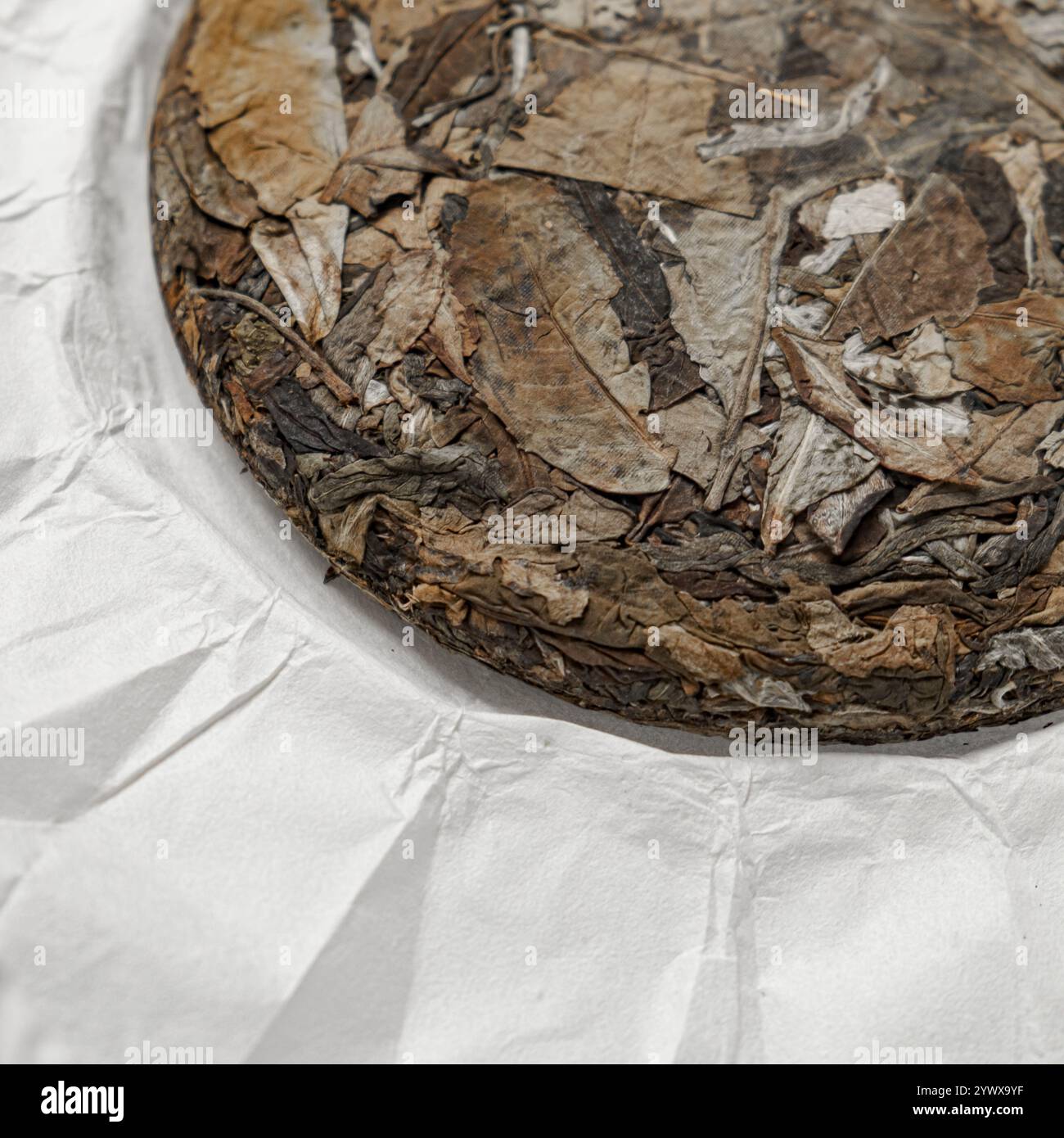 A beautifully presented Dried Leaves Tea Cake displayed elegantly on a ...