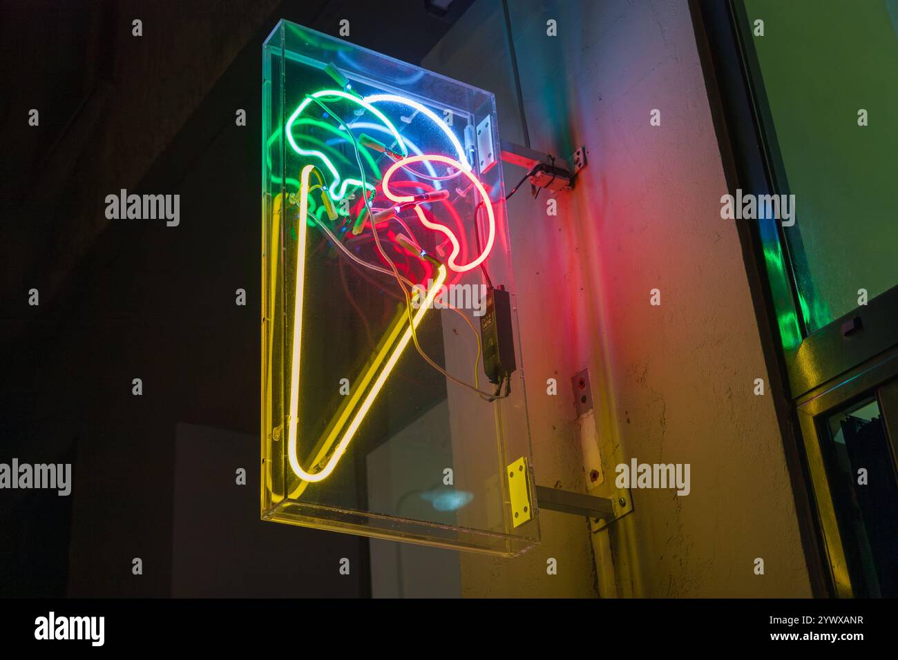 Neon sign ice cream in colored contour shape, yellow red green and blue ...