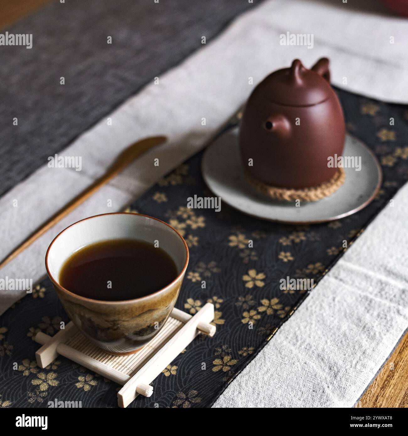 An Elegant Tea Setup That Features a Beautifully Crafted Traditional ...