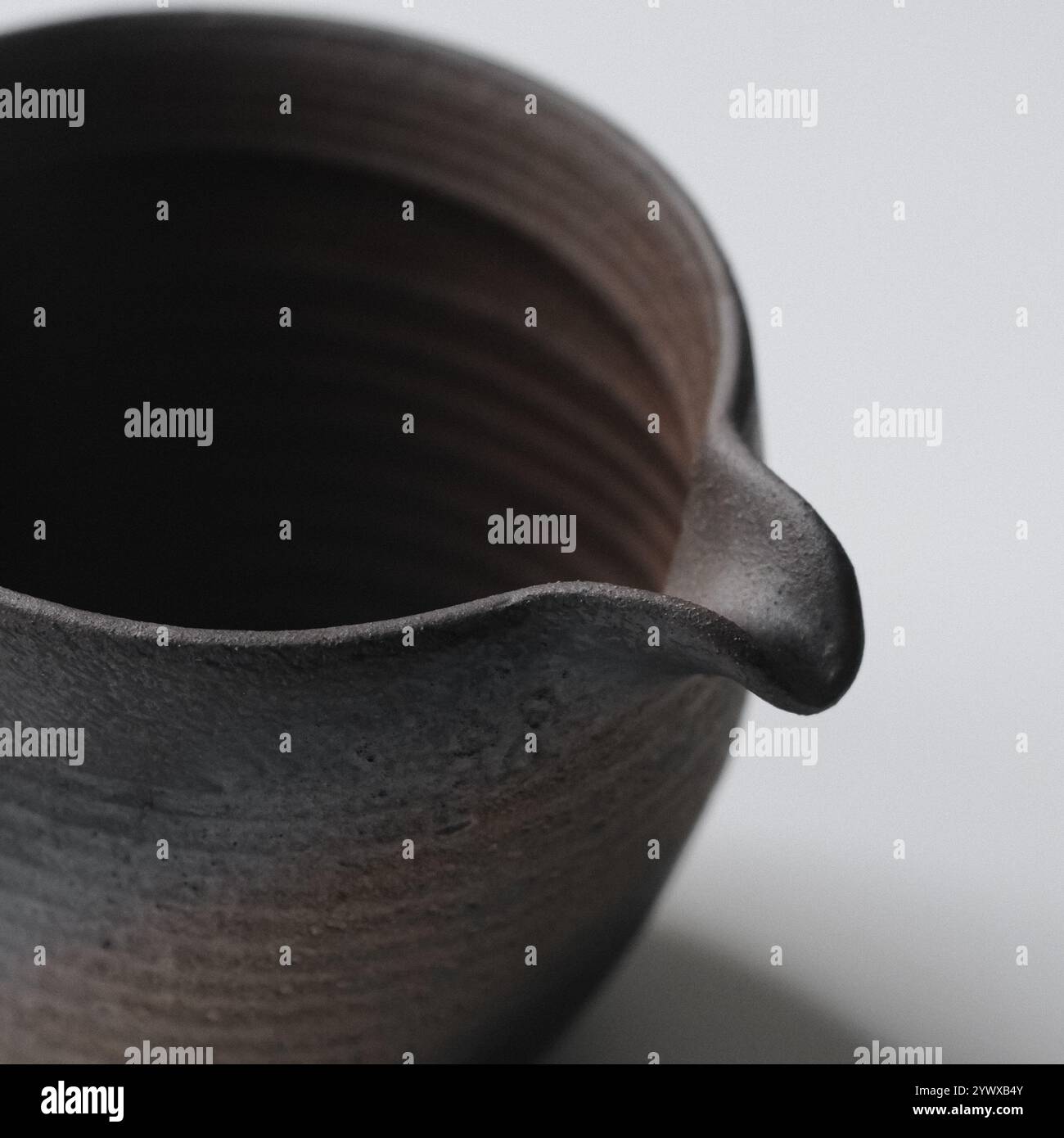 A Beautiful Minimalist Clay Pitcher Featuring a Distinctive and Unique ...