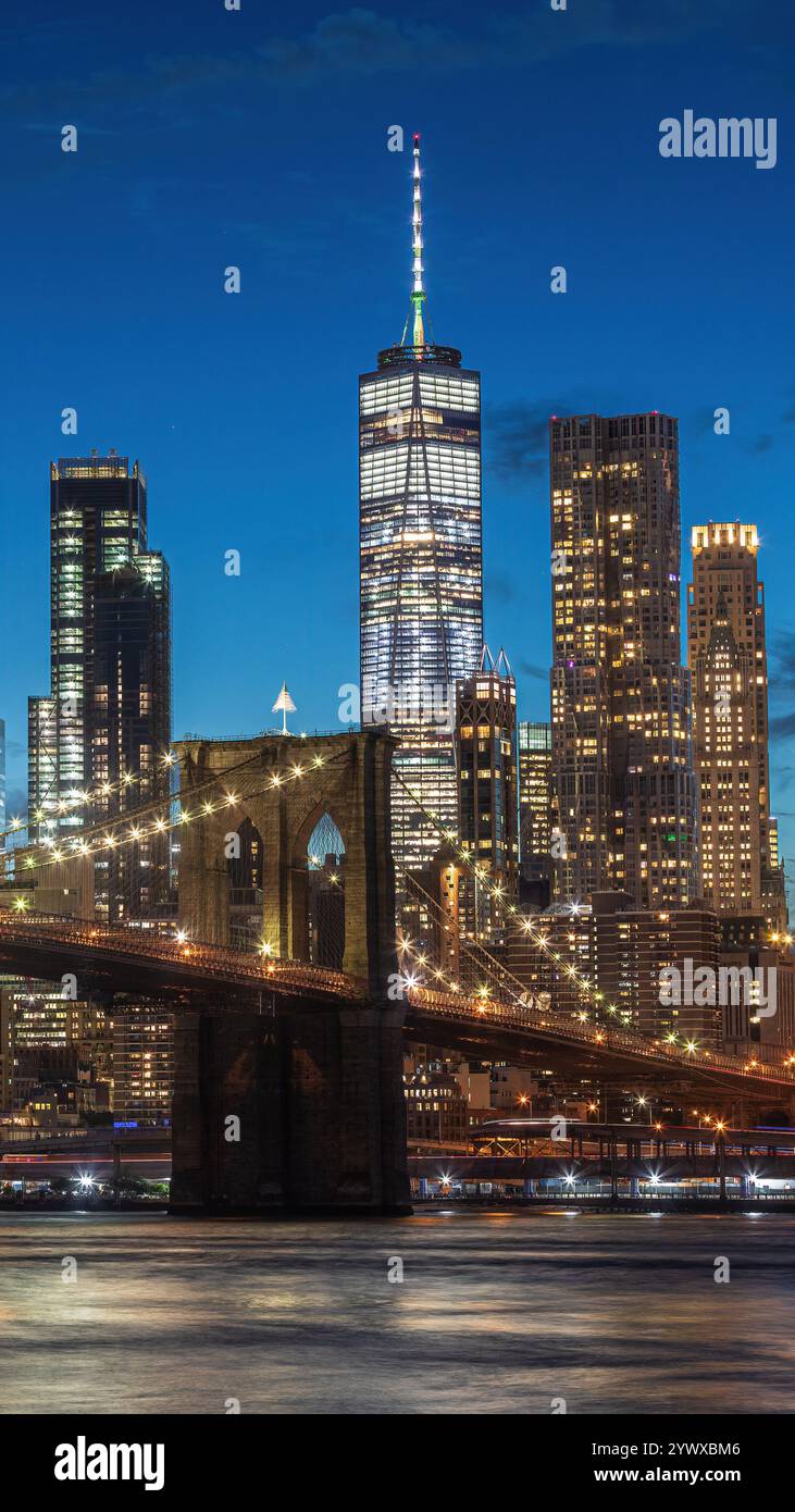 The photo captures the Brooklyn Bridge at night from Brooklyn, with ...