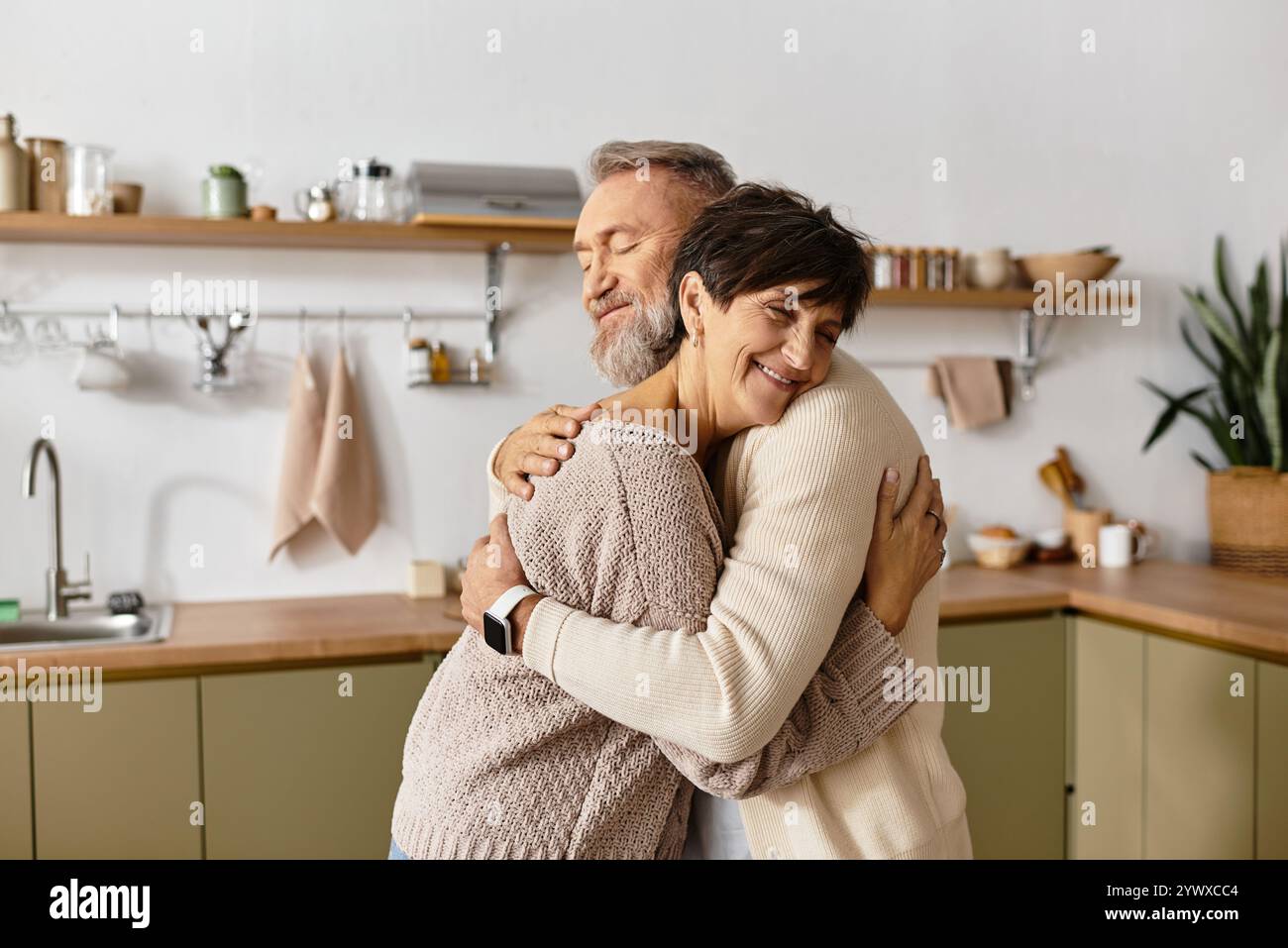 Man and woman hugging and express hi-res stock photography and images ...