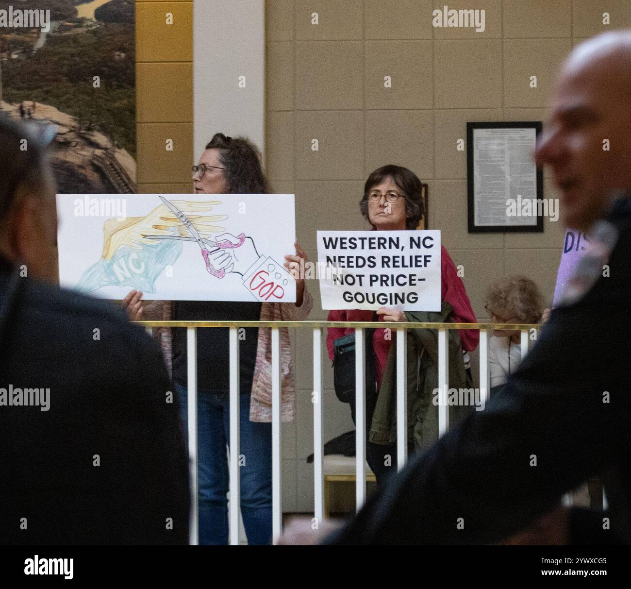 Visitors protest the vote to override Gov. Cooper's veto on Senate Bill ...