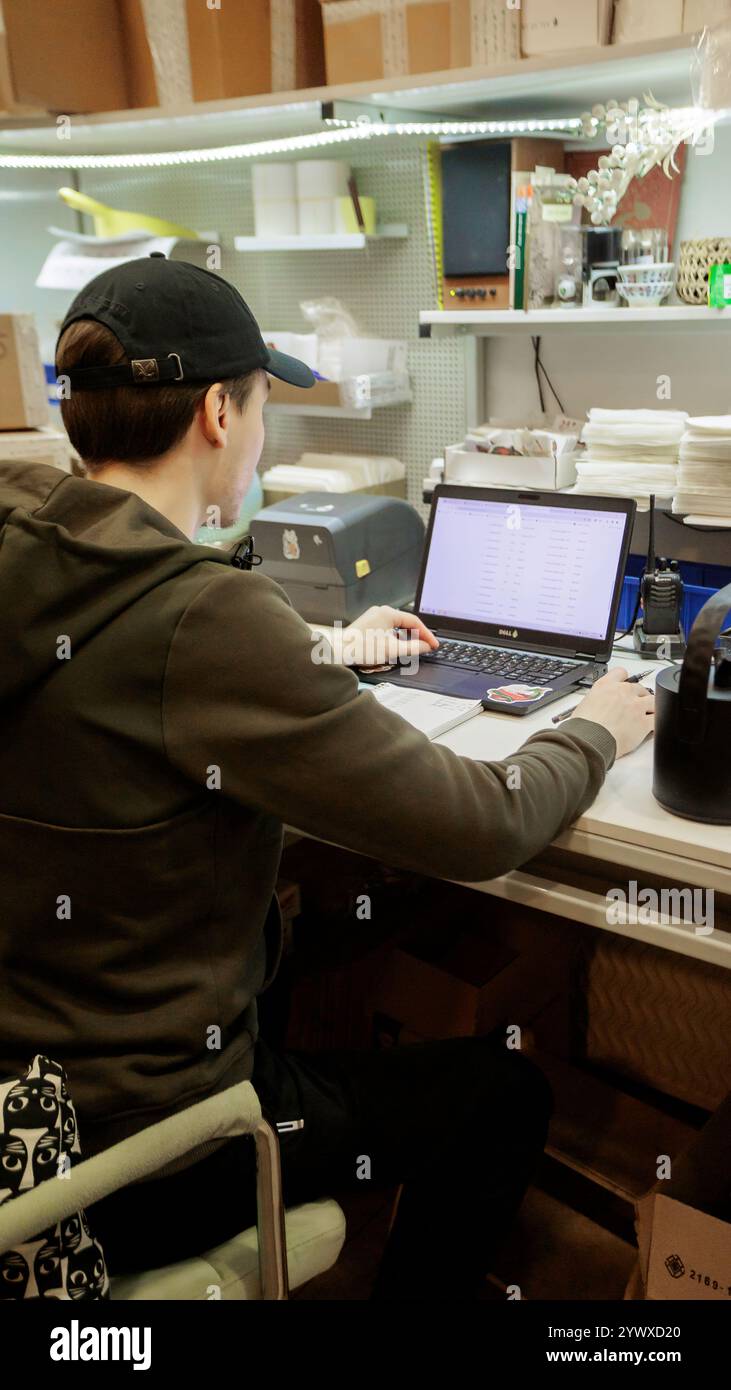 A Professional Media Stalker Effectively Working in a Busy Stockroom ...