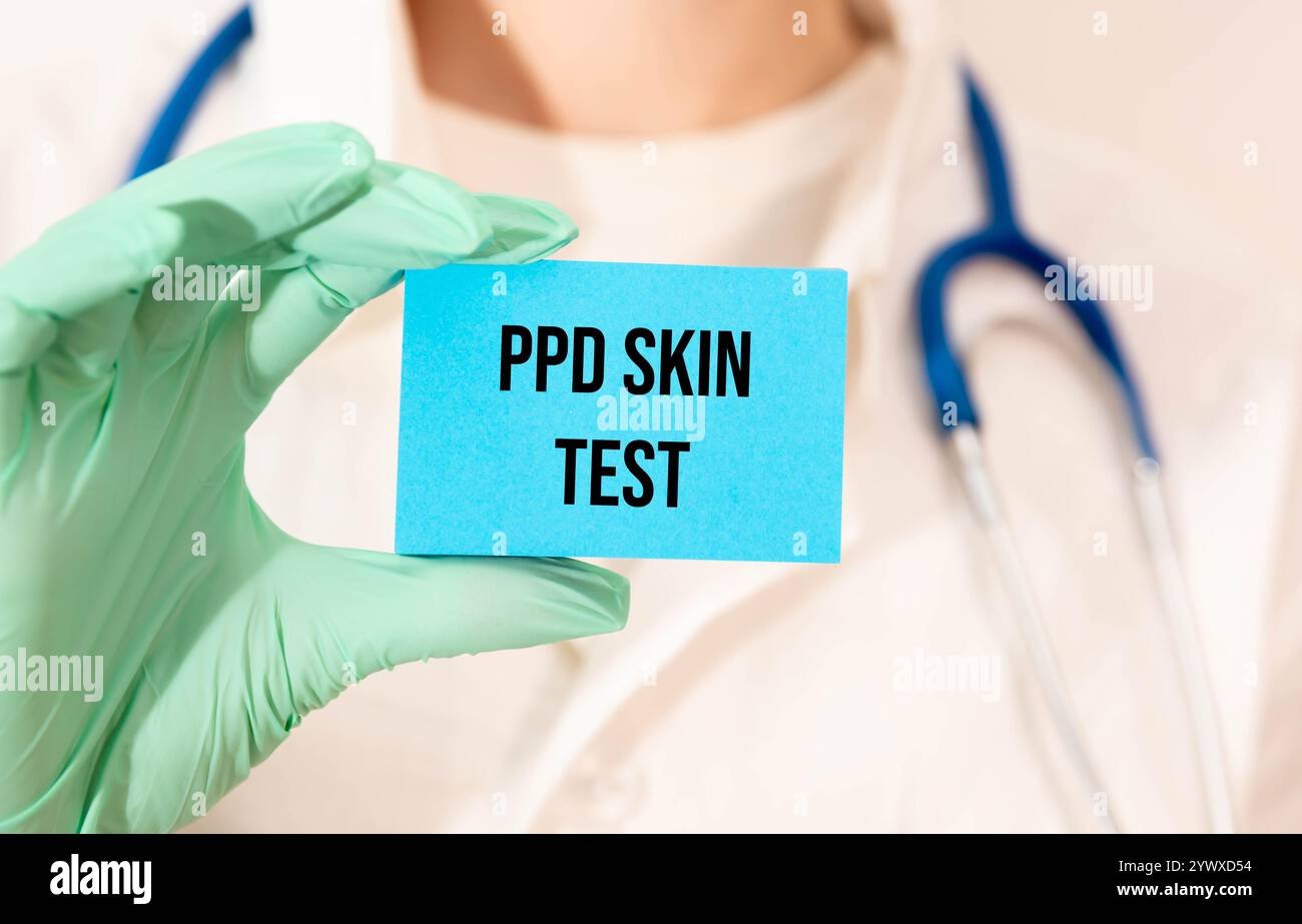 Grey stethoscope and paper plate with a sheet of white paper with text ...