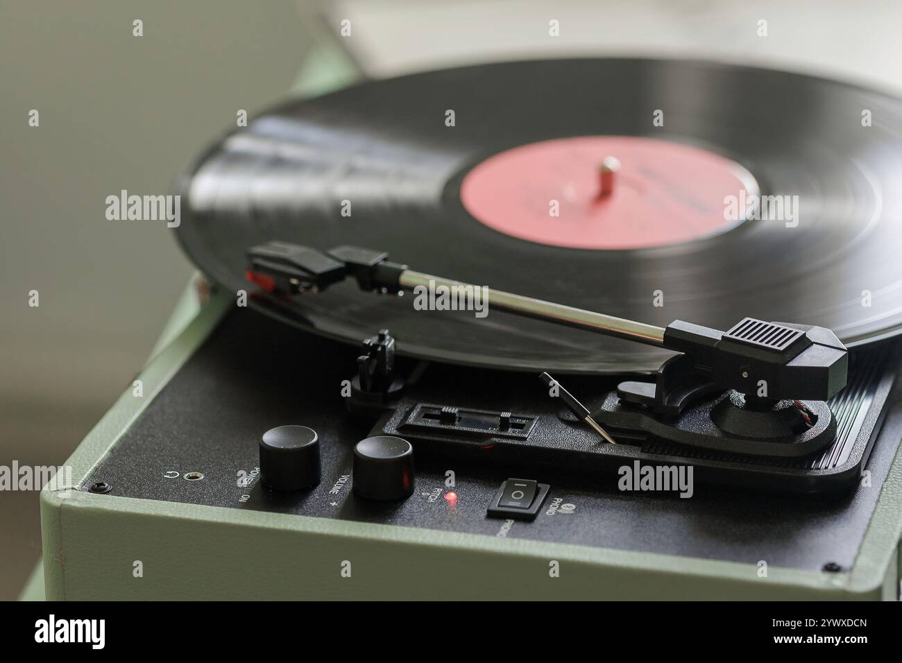 A Vintage Turntable is beautifully Playing a Classic Vinyl Record from ...